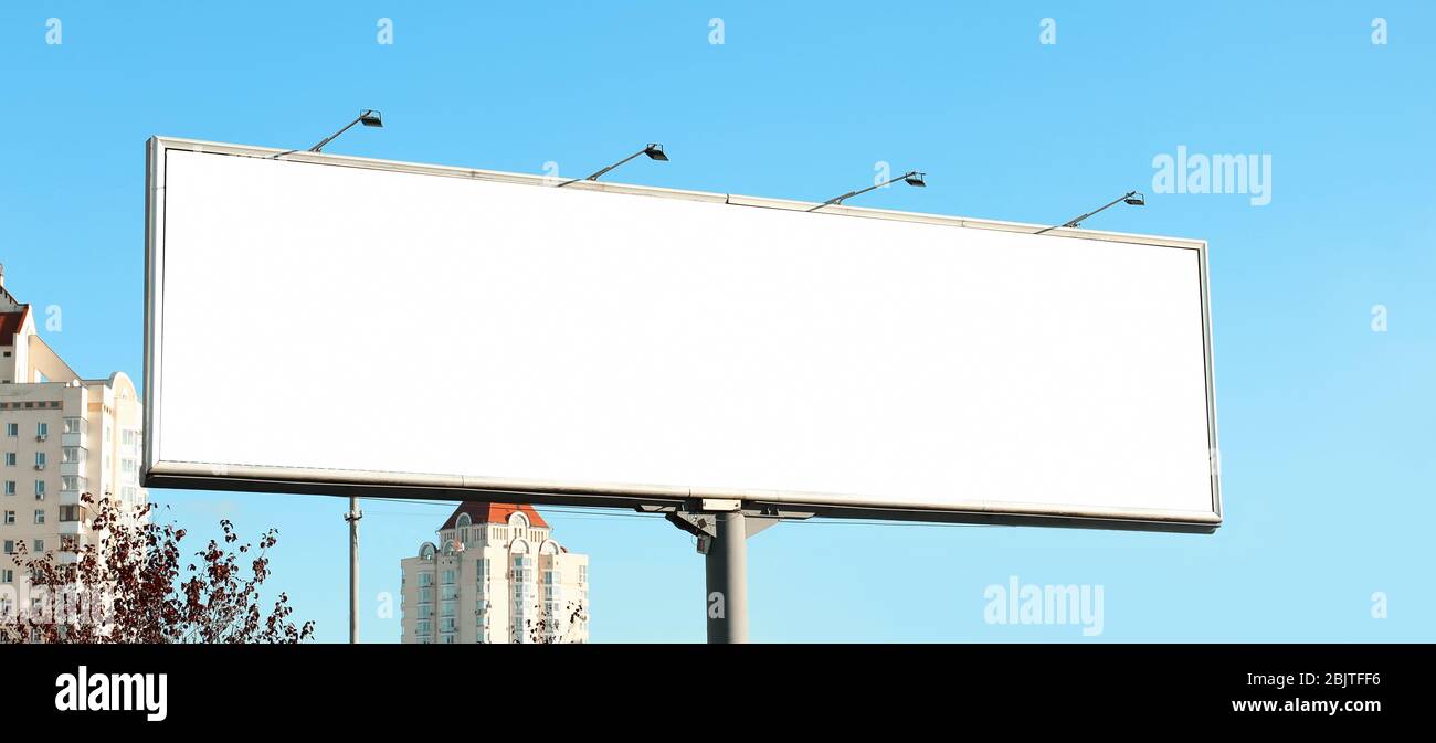 Blank advertising board on city street Stock Photo - Alamy