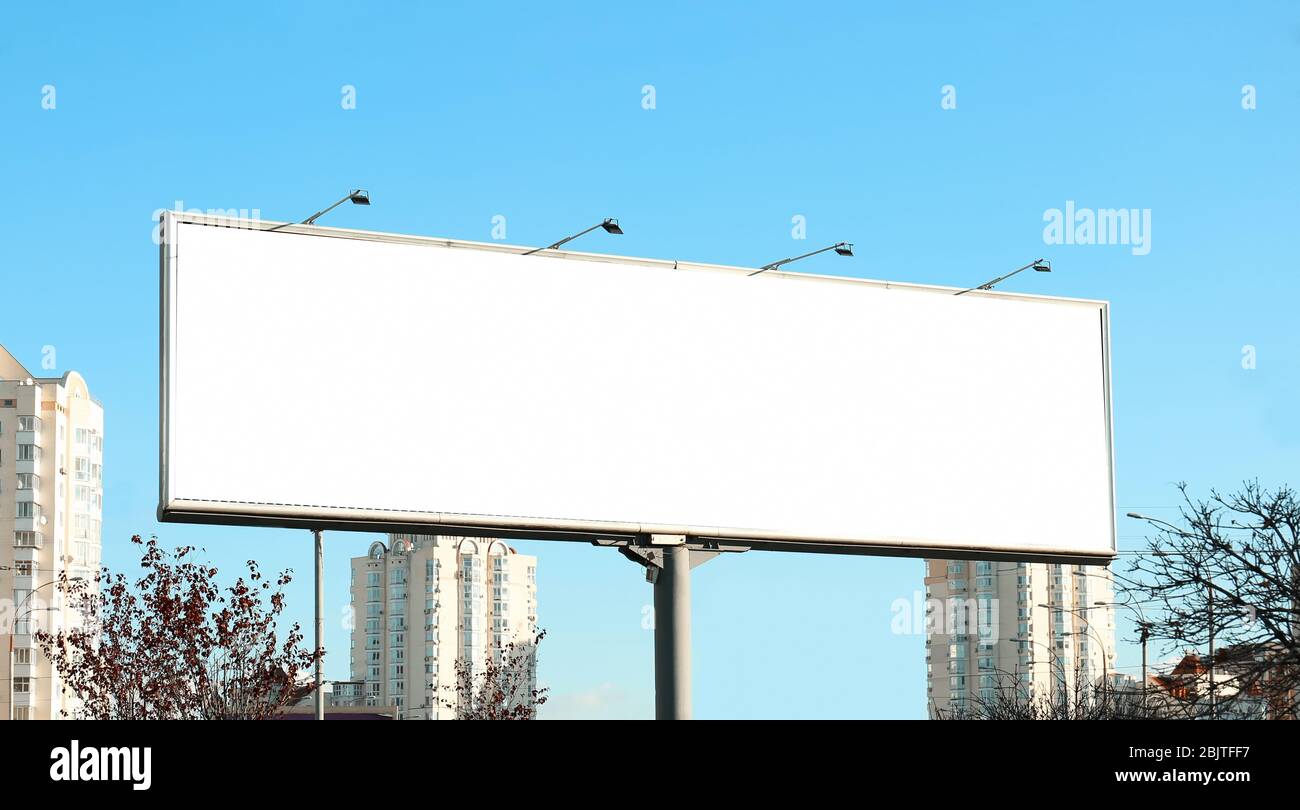 Blank advertising board on city street Stock Photo - Alamy