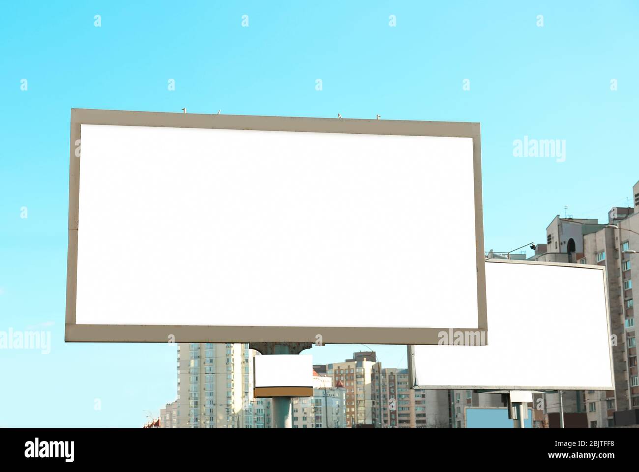 Blank advertising board on city street Stock Photo - Alamy