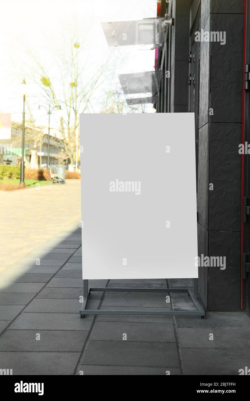 Blank advertising board on city street Stock Photo - Alamy