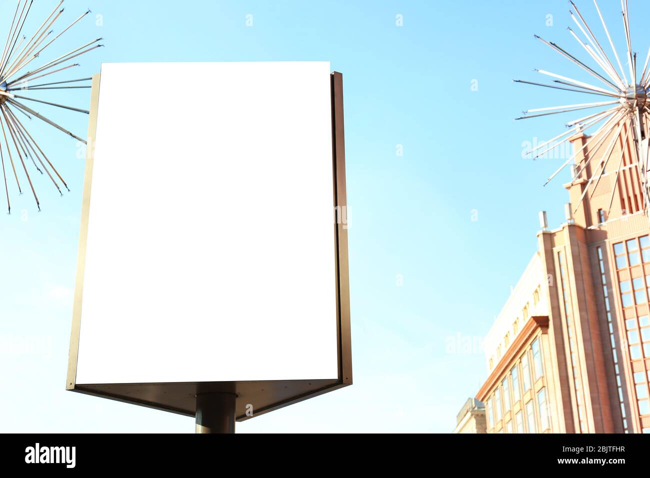 Blank advertising board on city street Stock Photo - Alamy
