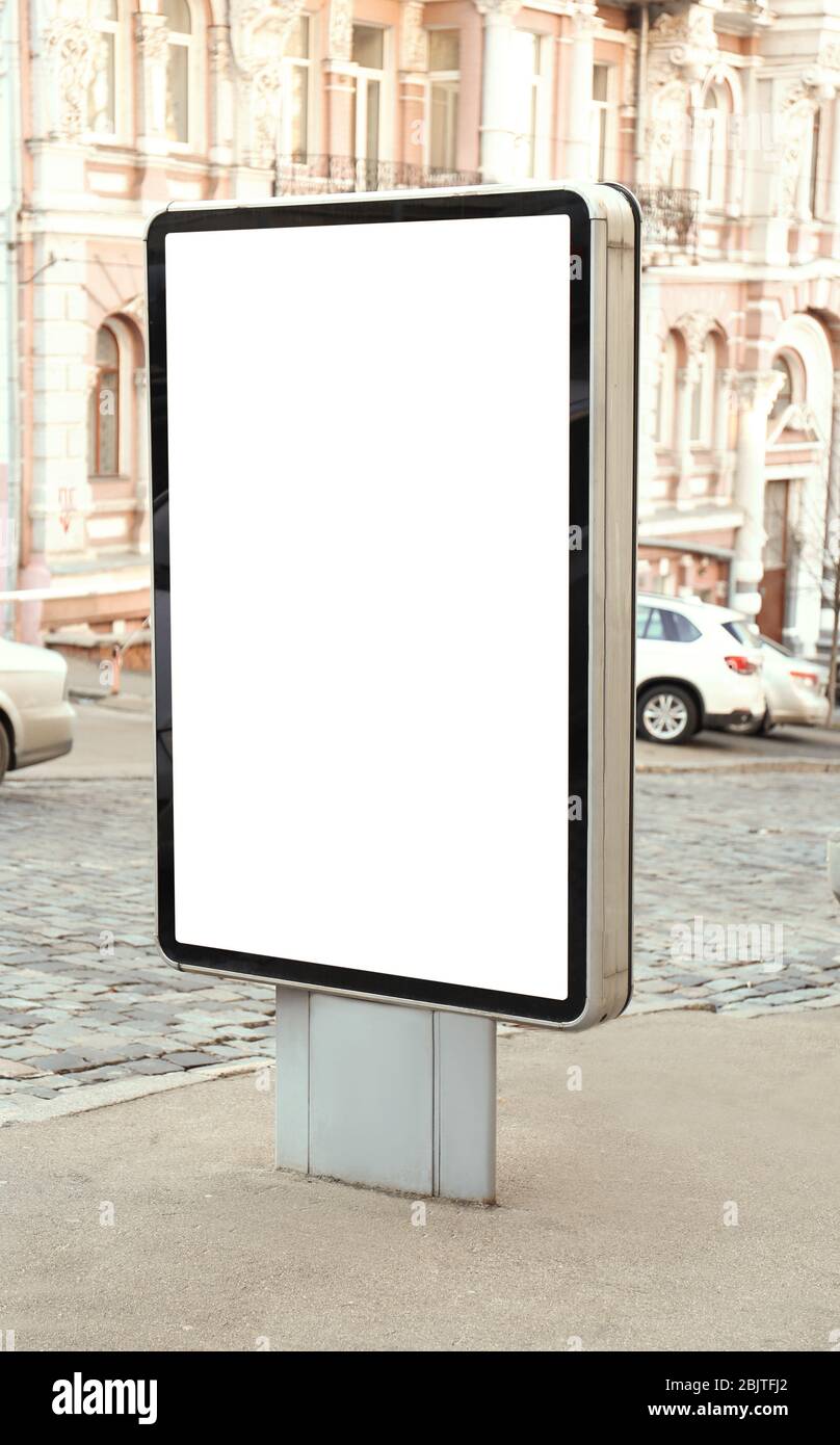 Blank advertising board on city street Stock Photo - Alamy