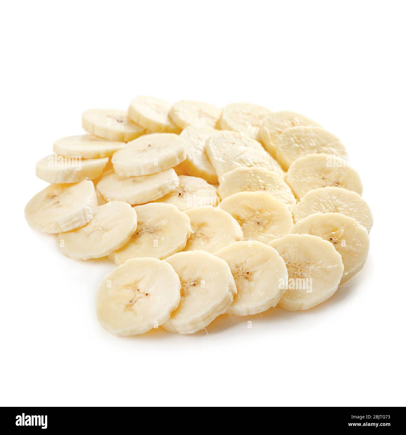 Banana slices on white background Stock Photo - Alamy