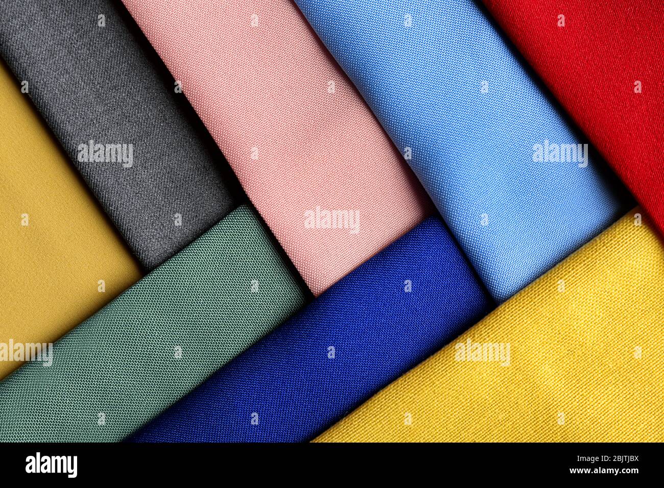 Colorful fabric samples as background Stock Photo - Alamy