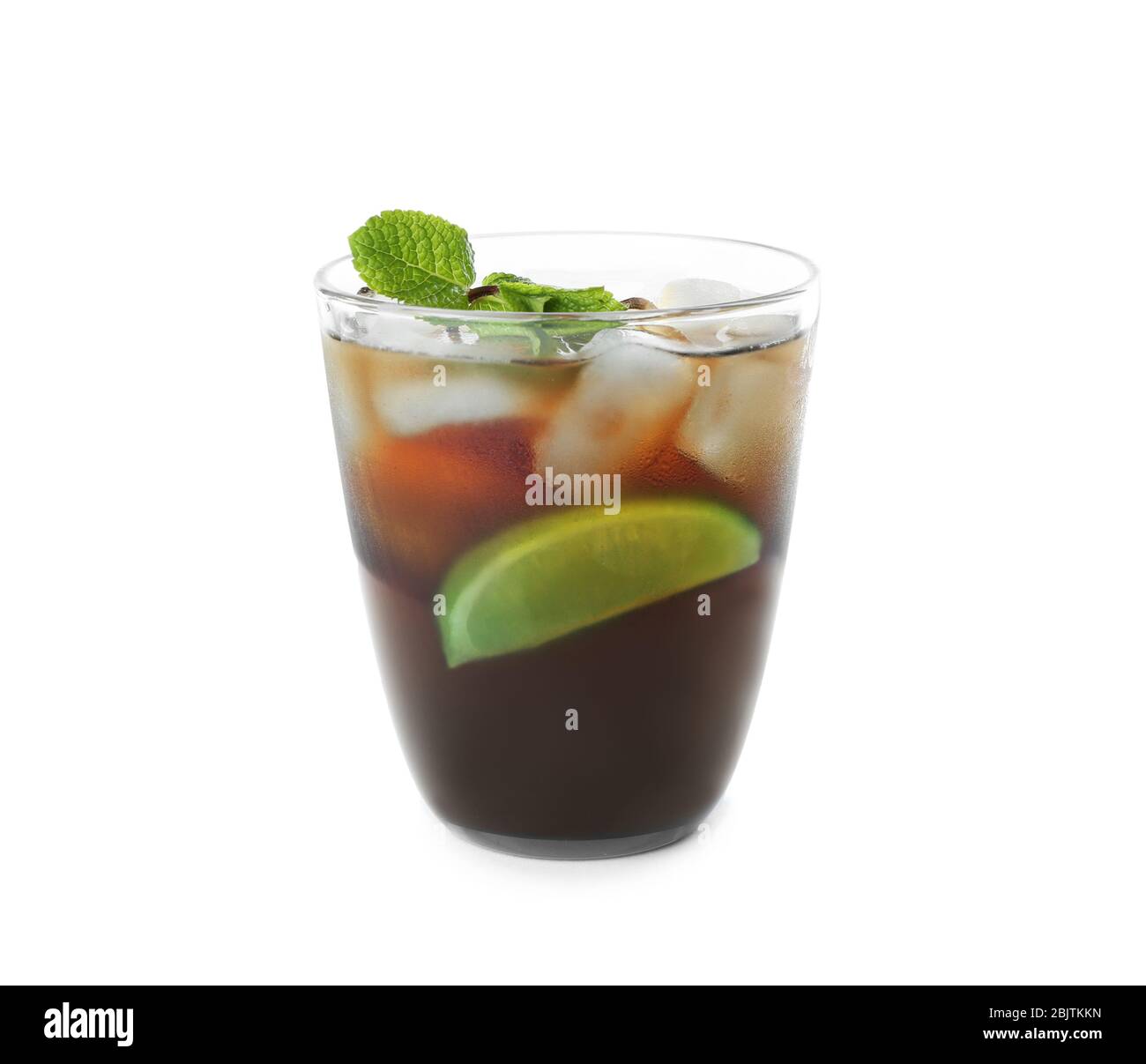 Glass of Cuba Libre cocktail on white background Stock Photo - Alamy