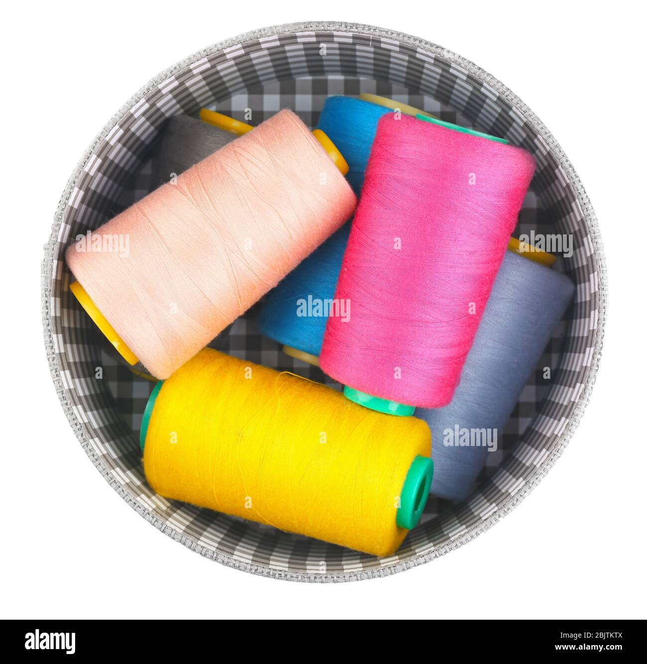 Box with color sewing threads on white background Stock Photo - Alamy