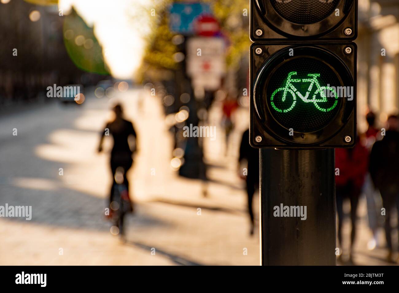 Sustainable transport. Bicycle traffic signal, green light, road bike ...