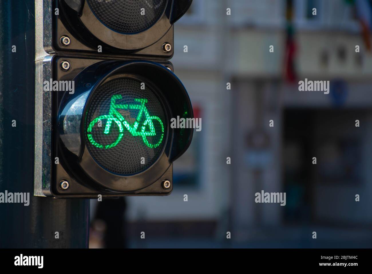 Sustainable transport. Bicycle traffic signal, green light, road bike ...
