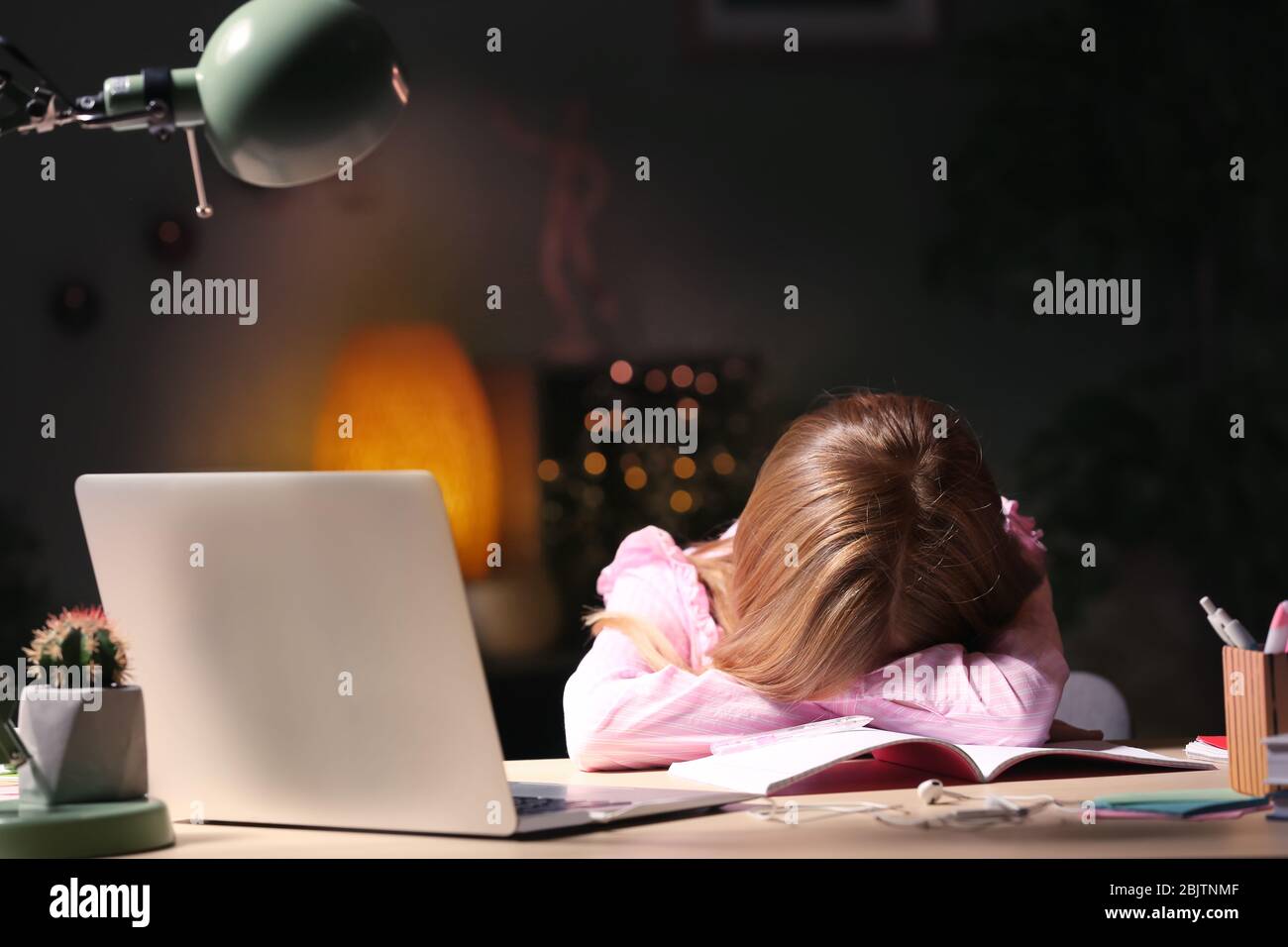 Child falling asleep with computer hi-res stock photography and images ...