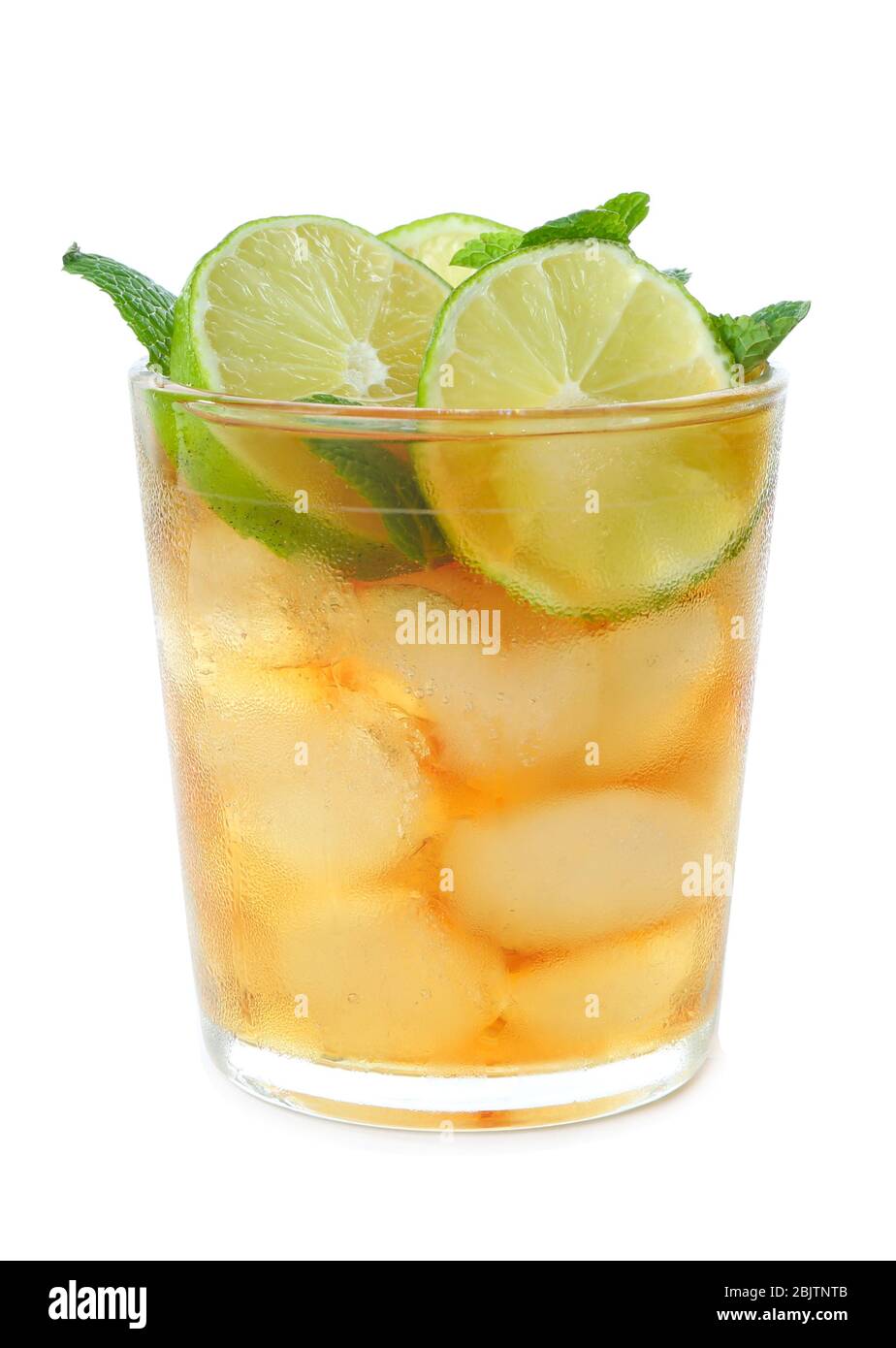 Glass with Cuba Libre cocktail on white background Stock Photo - Alamy