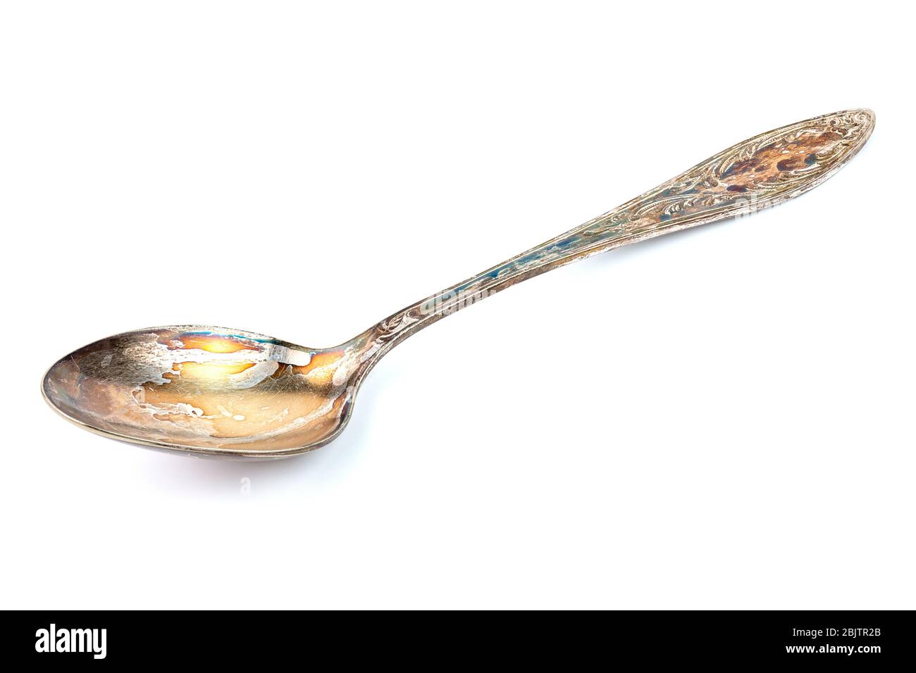 German silver or cupronickel spoon with visible oxidation layer ...
