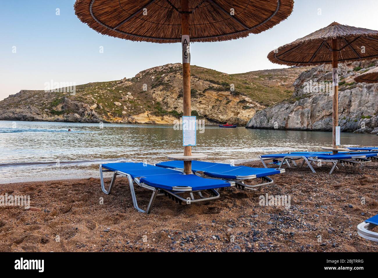 The famous rocky beach Melidoni at sunset. Amazing scenery with crystal ...