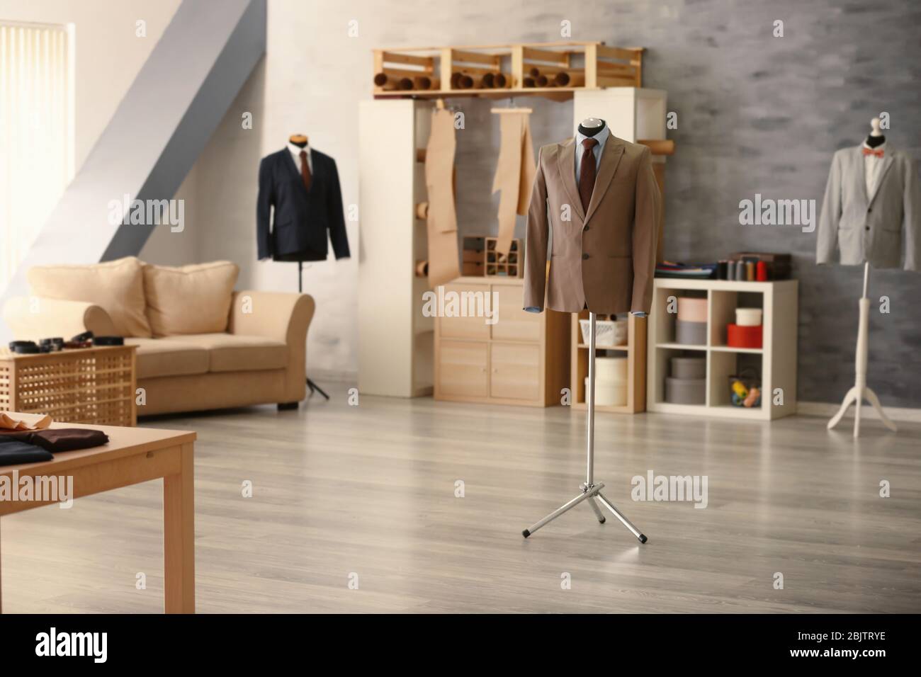 Interior of modern tailor's workshop Stock Photo - Alamy