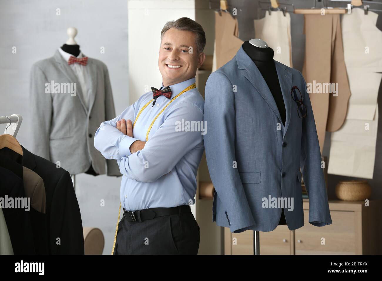 Tailor standing near male hi-res stock photography and images - Alamy