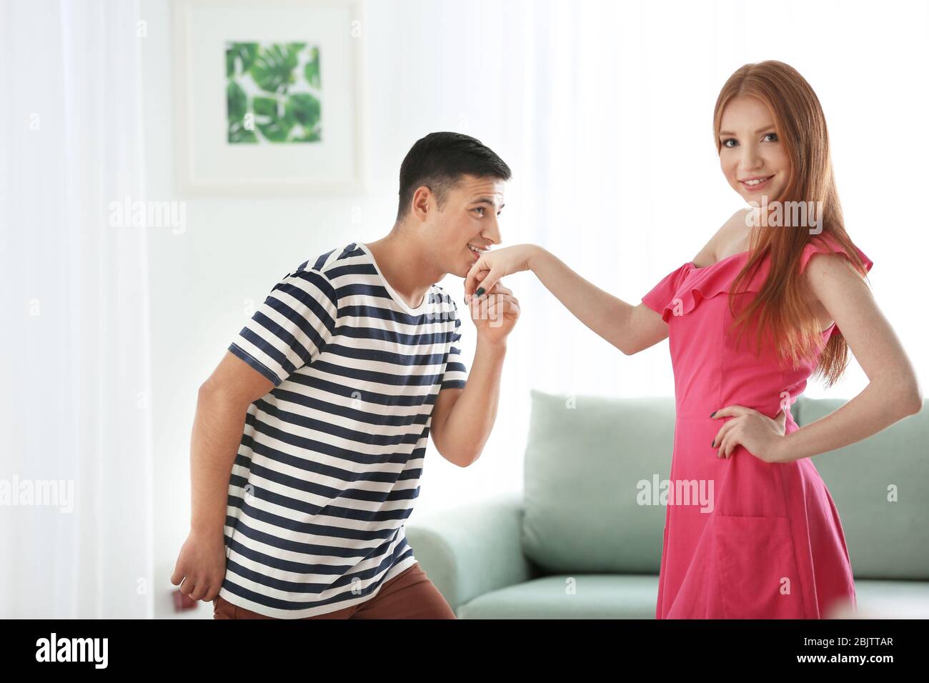 Man kissing hand hi-res stock photography and images - Alamy