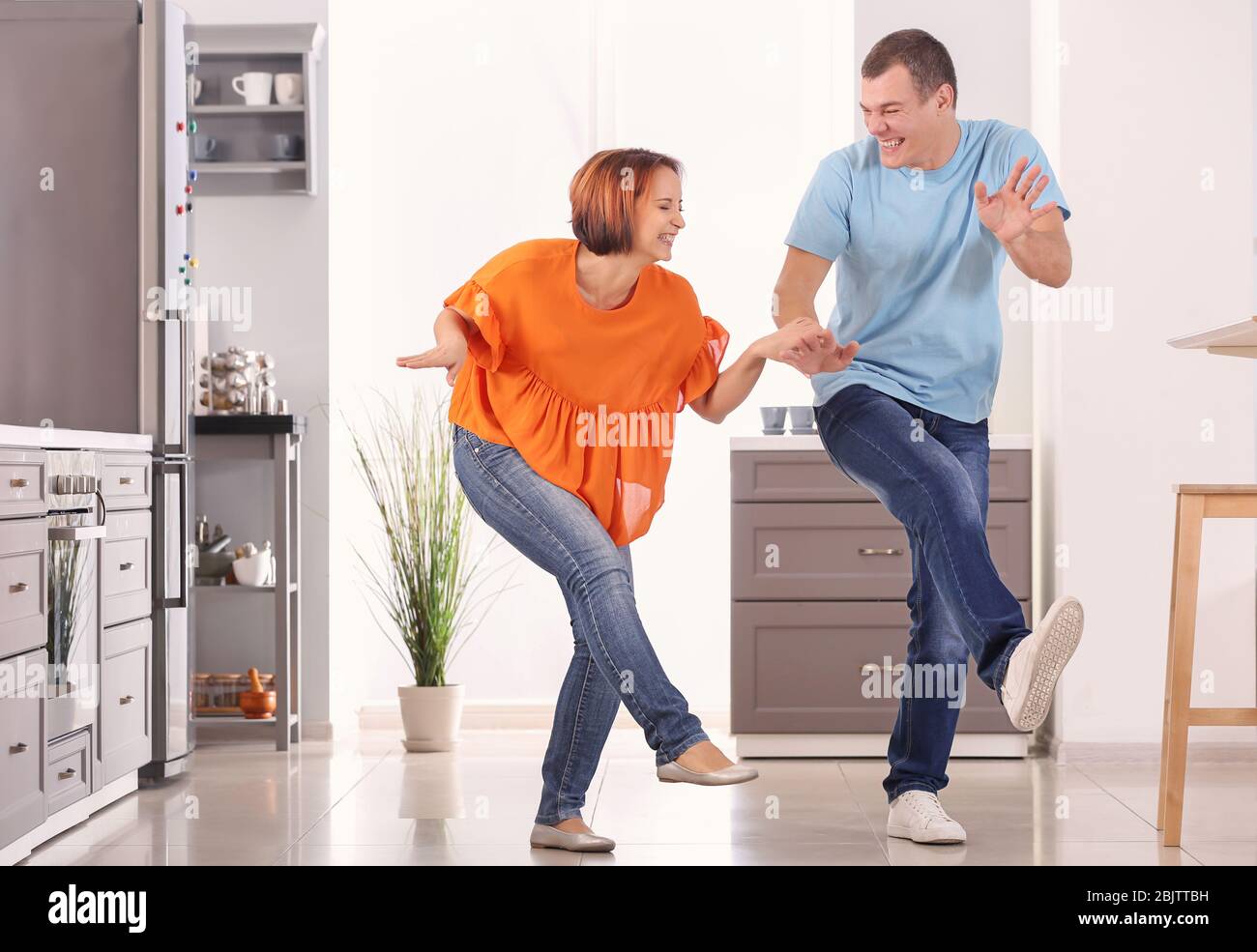 Cute loving couple dancing at home Stock Photo - Alamy