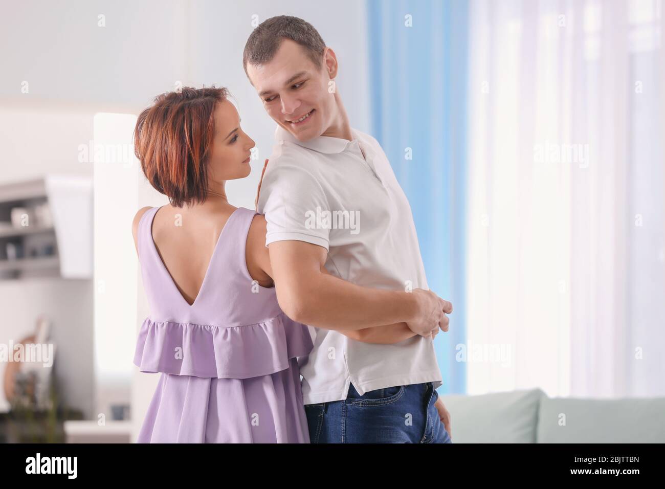 Cute loving couple dancing at home Stock Photo - Alamy