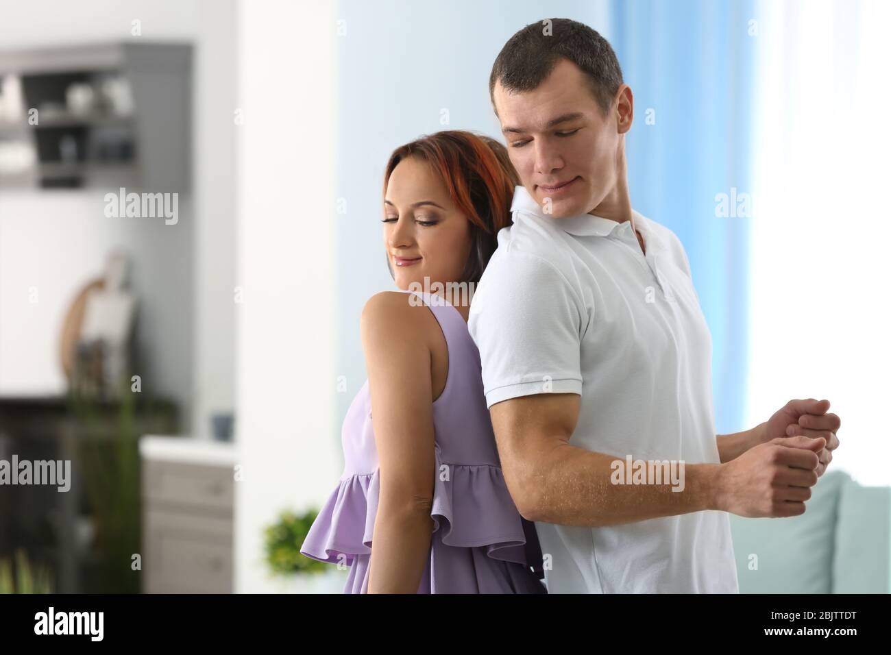Cute loving couple dancing at home Stock Photo - Alamy