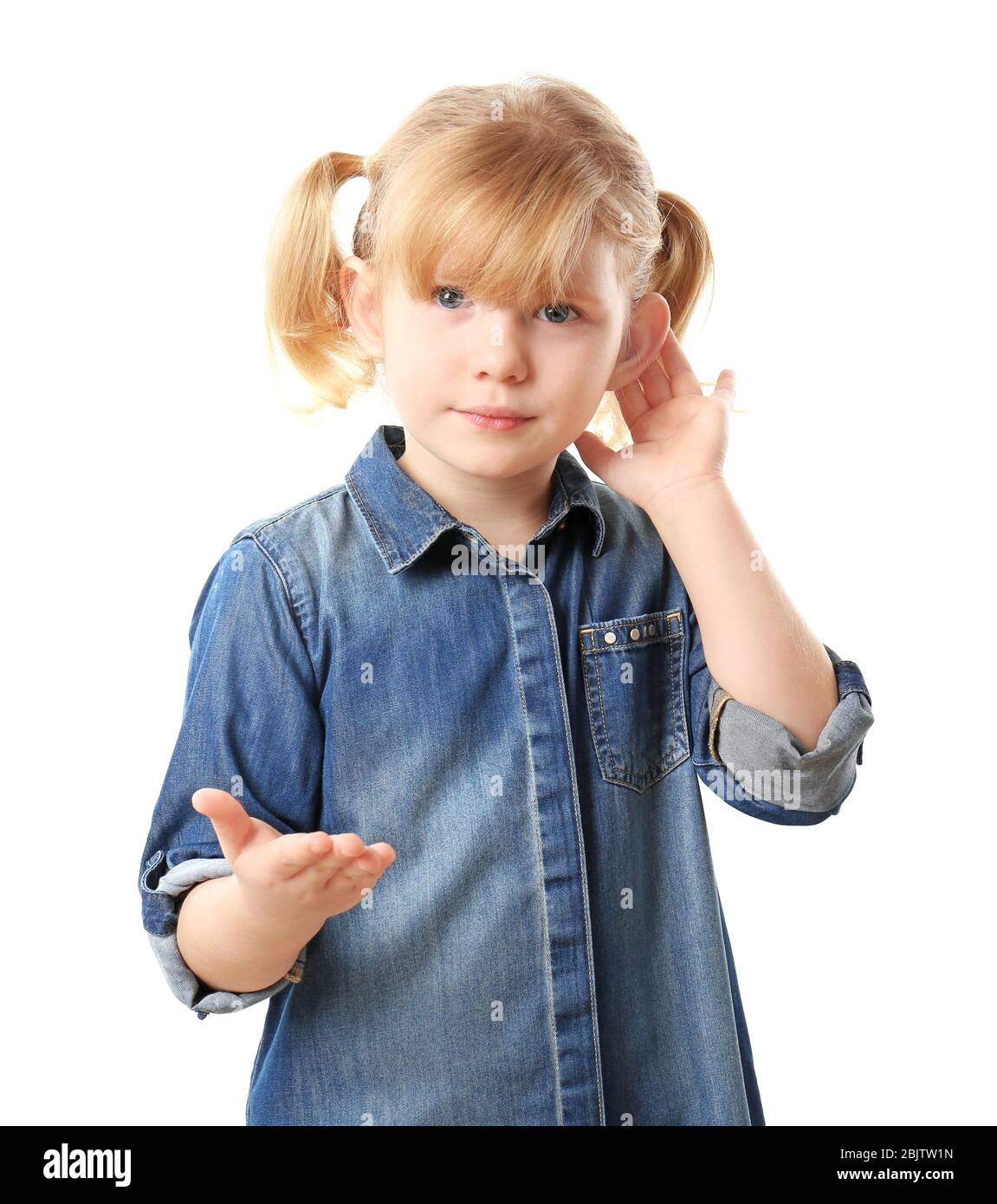 Cute little girl with hearing problem on white background Stock Photo ...
