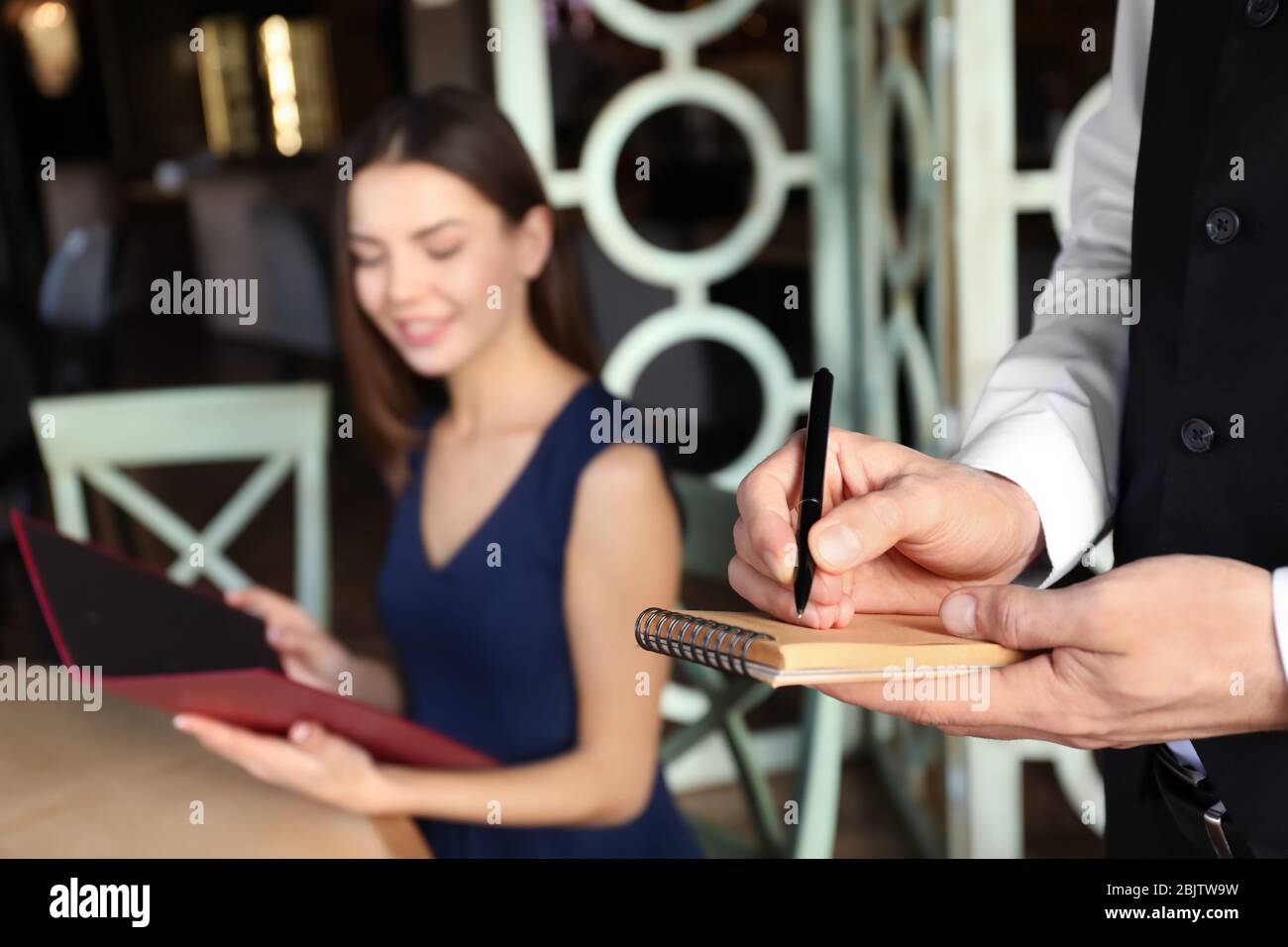 Female waitstaff hi-res stock photography and images - Alamy