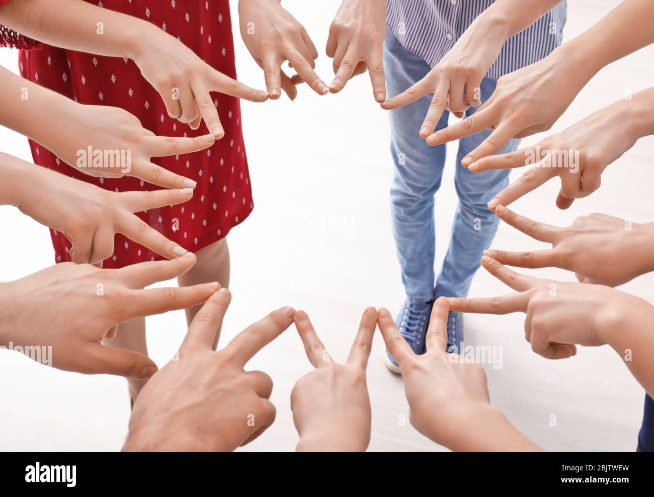 Young people making circle with their hands as symbol of unity Stock ...