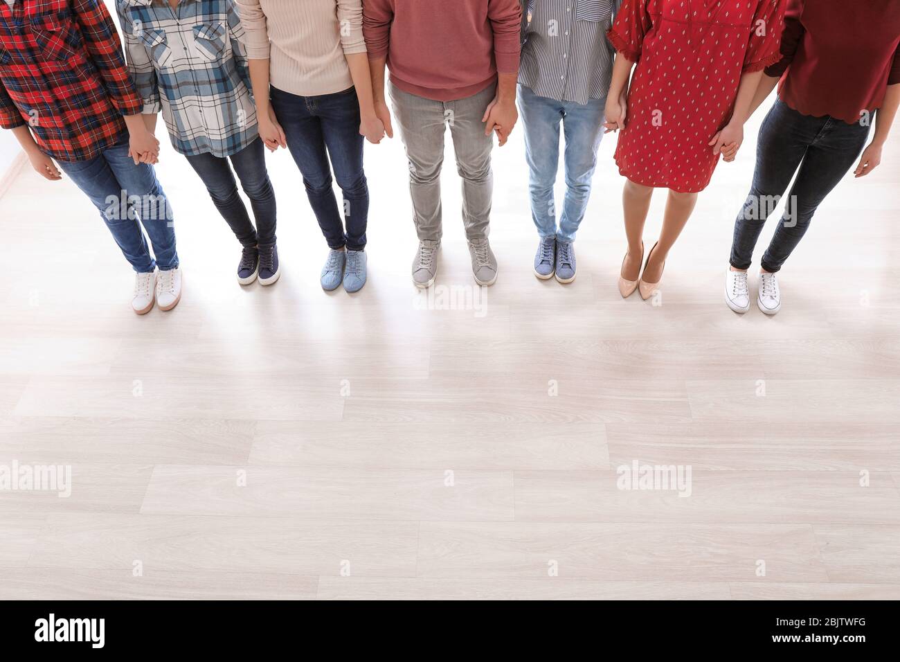 Group of people holding hands. Unity concept Stock Photo - Alamy