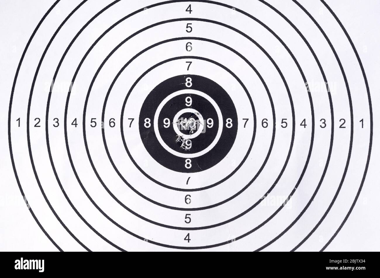 Shooting target with holes Stock Photo - Alamy