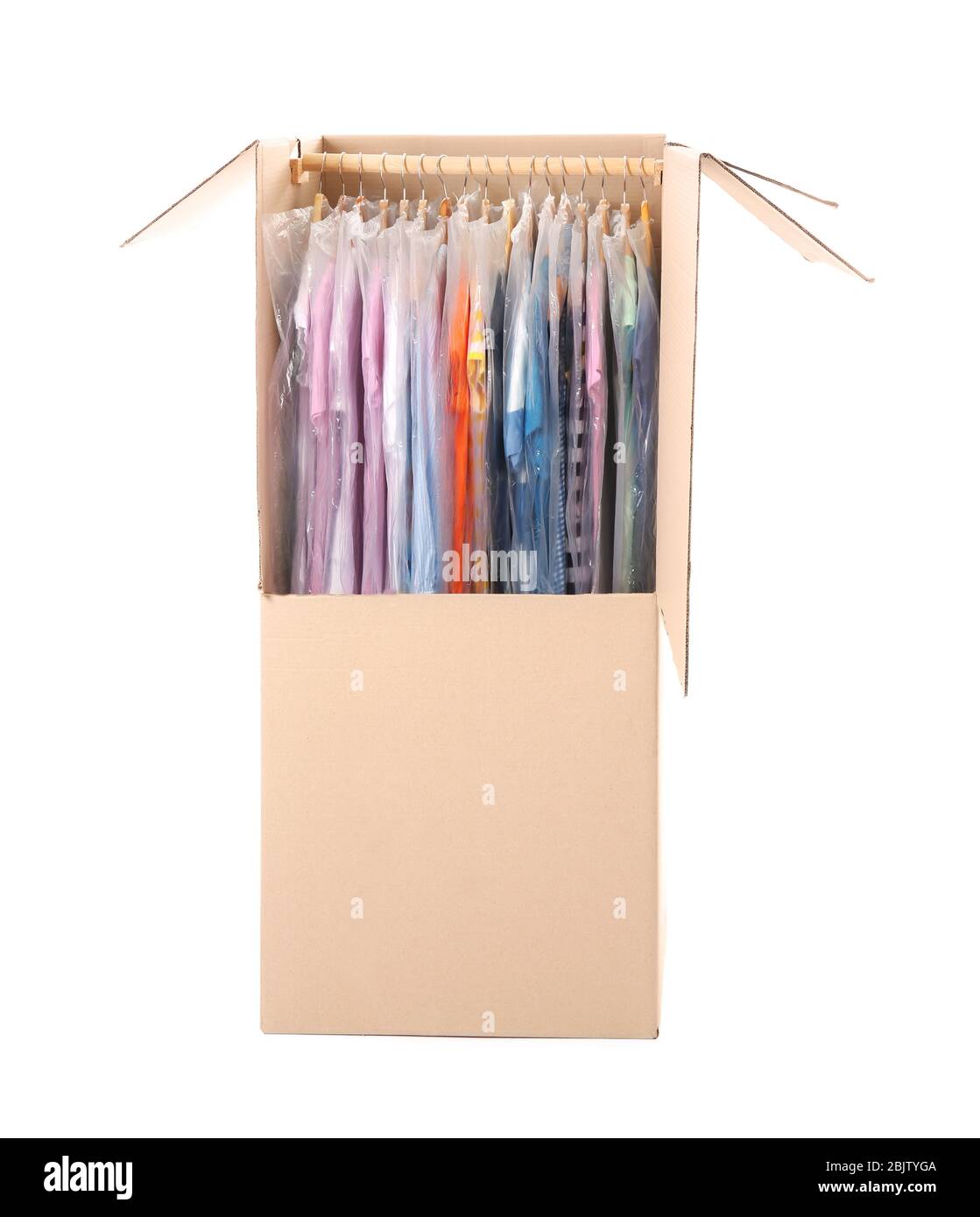 Wardrobe box with clothes on white background Stock Photo - Alamy