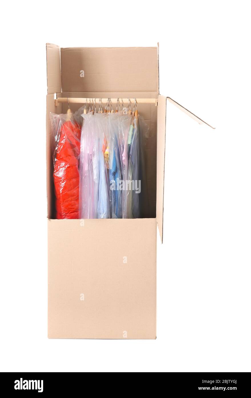 Wardrobe box with clothes on white background Stock Photo - Alamy
