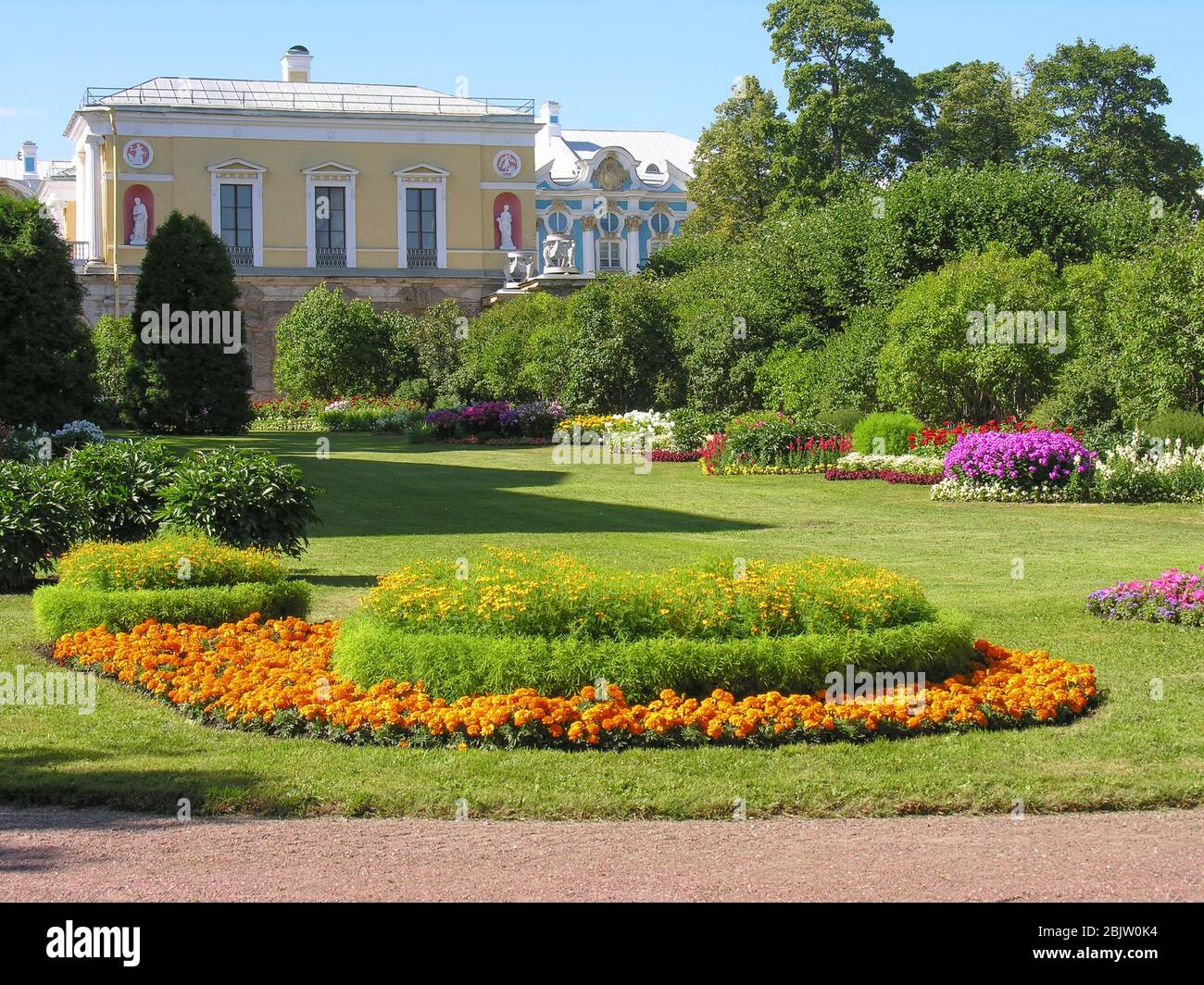 Formal garden with lush, colorful flowers and greenery in a park in St ...