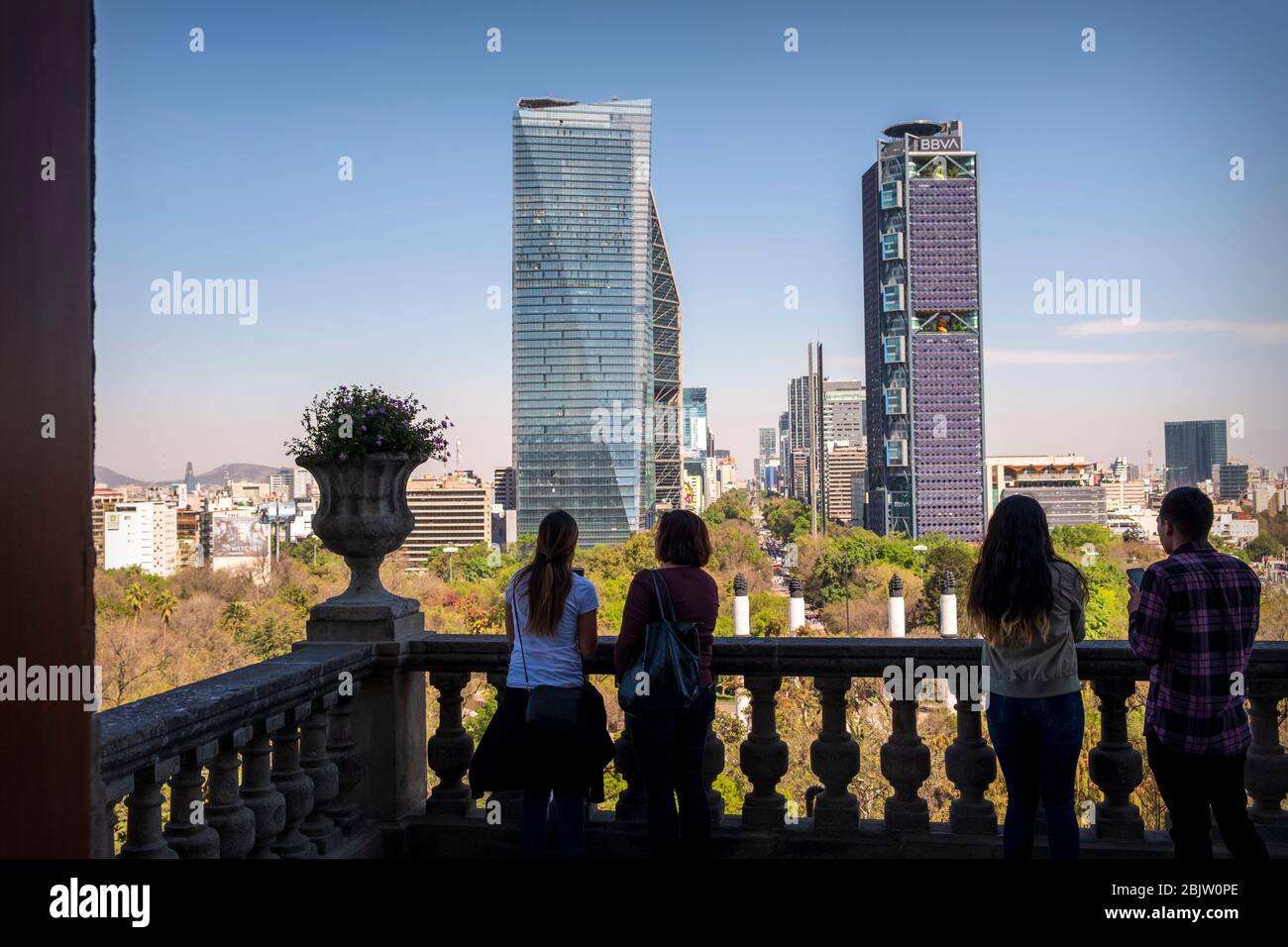 Skyline in daytime of Mexico City People in foreground (at Chapultepec ...
