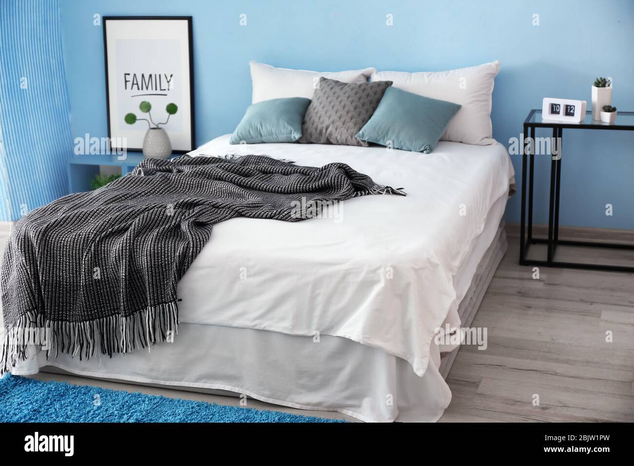 Beautiful room interior with bed Stock Photo - Alamy