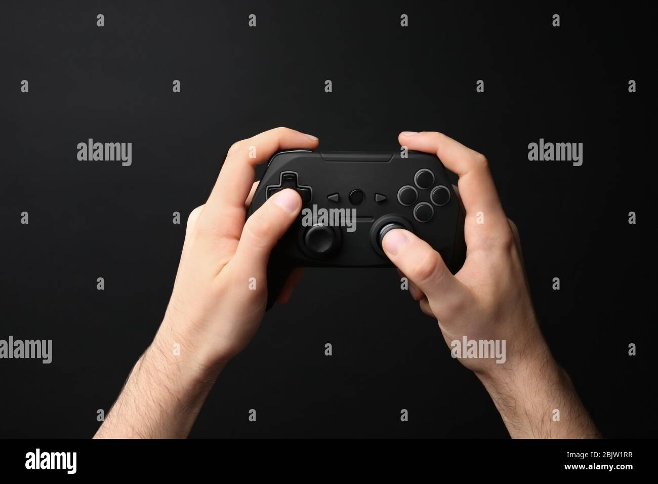 Man holding game controller hands hi-res stock photography and images ...