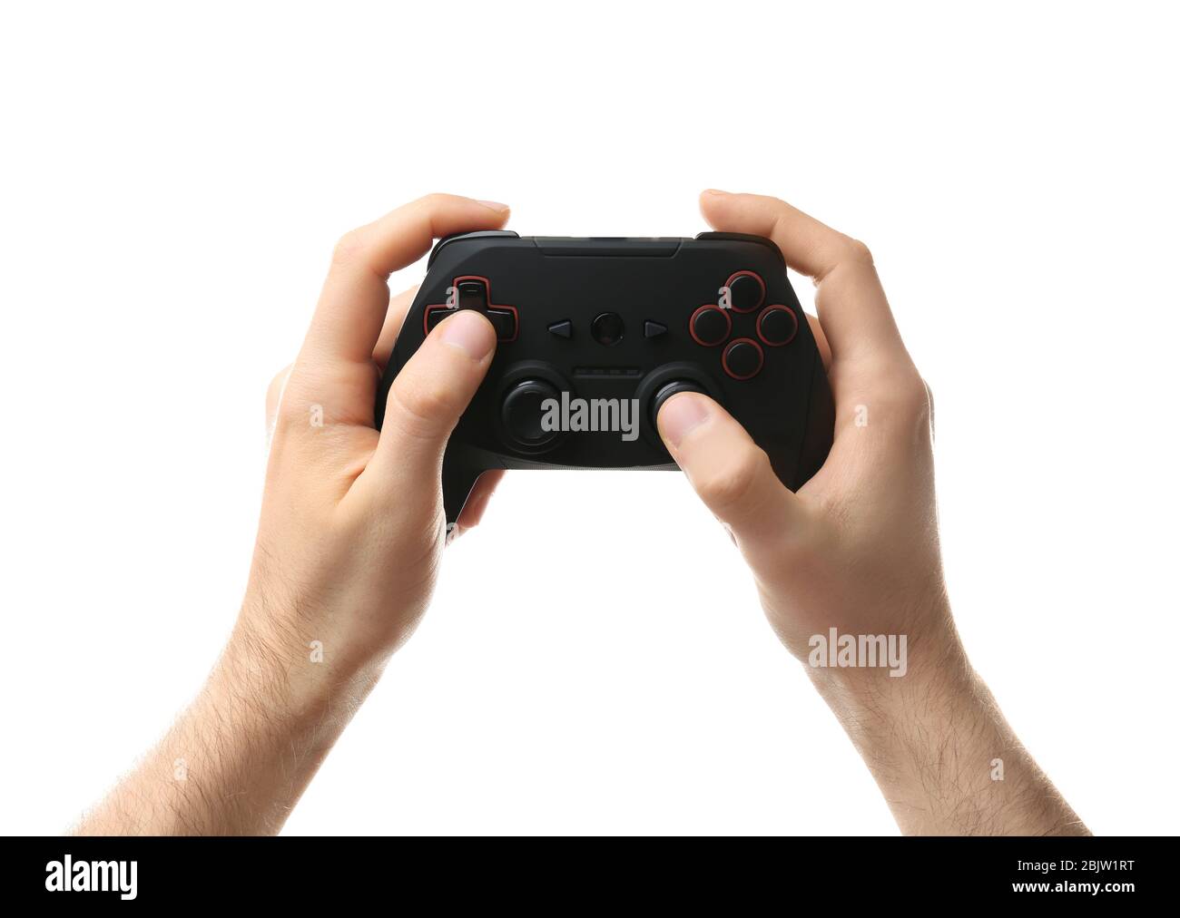 Man holding video game controller on white background Stock Photo - Alamy