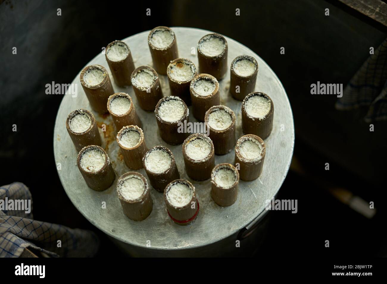 Putu bambu sale at street food market, Indonesia Traditional Cake Stock ...