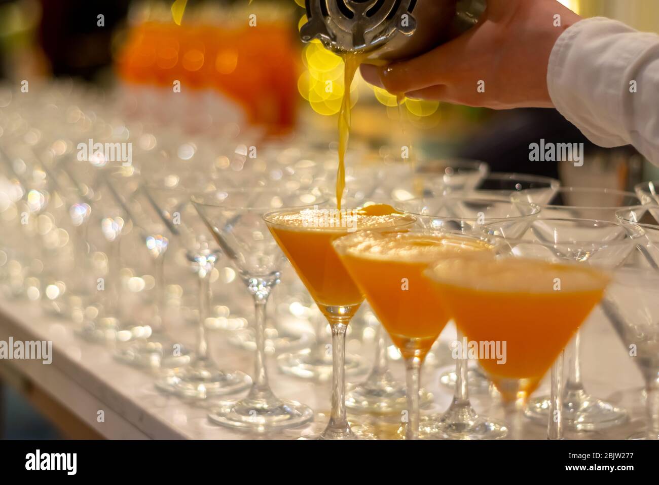 Barman pouring cocktails hi-res stock photography and images - Alamy
