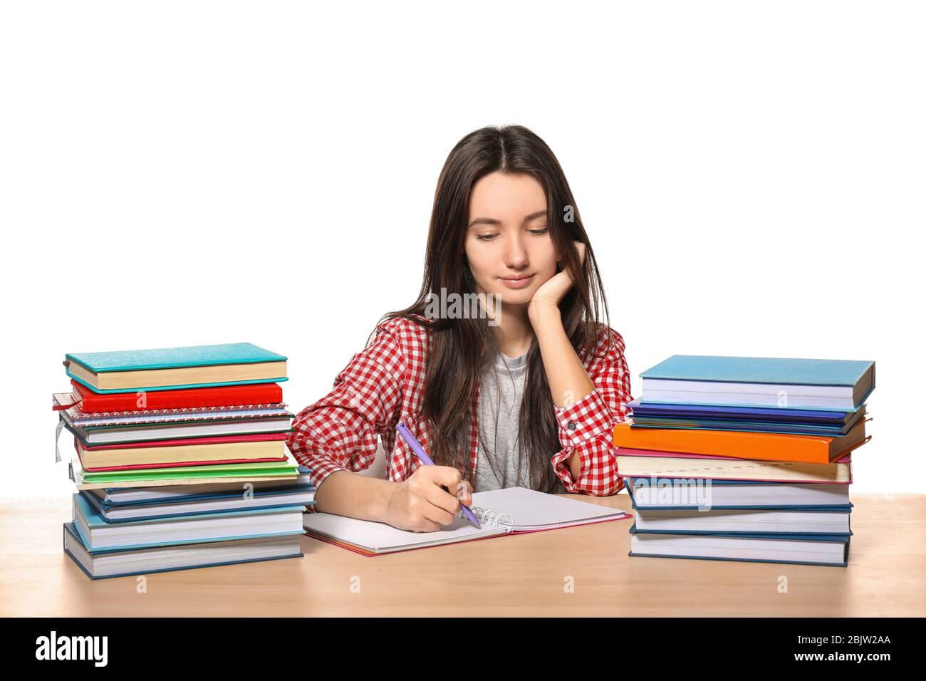 Teen girl sitting desk homework hi-res stock photography and images - Alamy