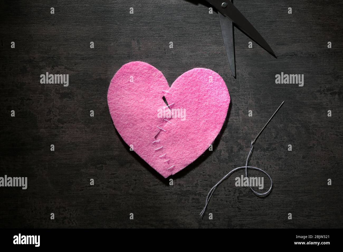 Cut in half scissors hi-res stock photography and images - Alamy