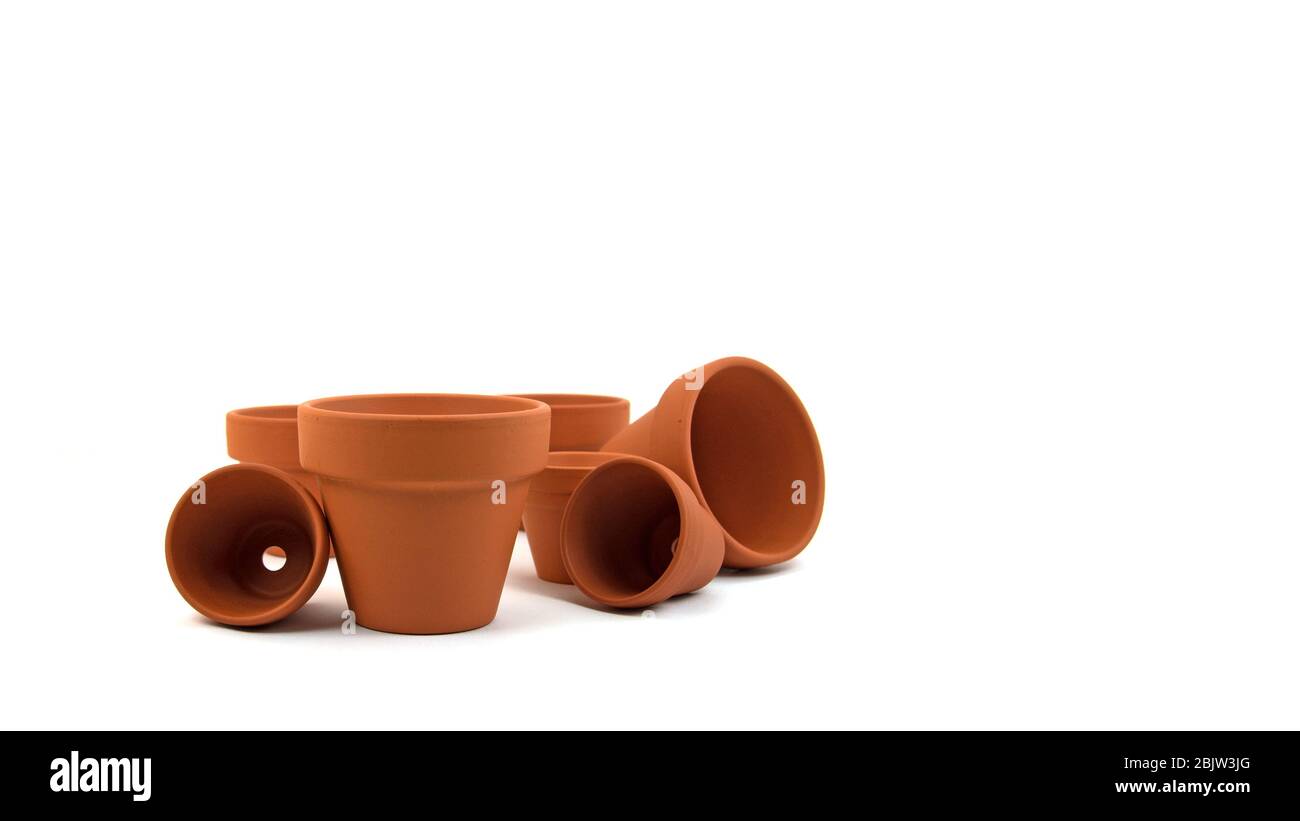 Empty flower pots against white background Stock Photo - Alamy