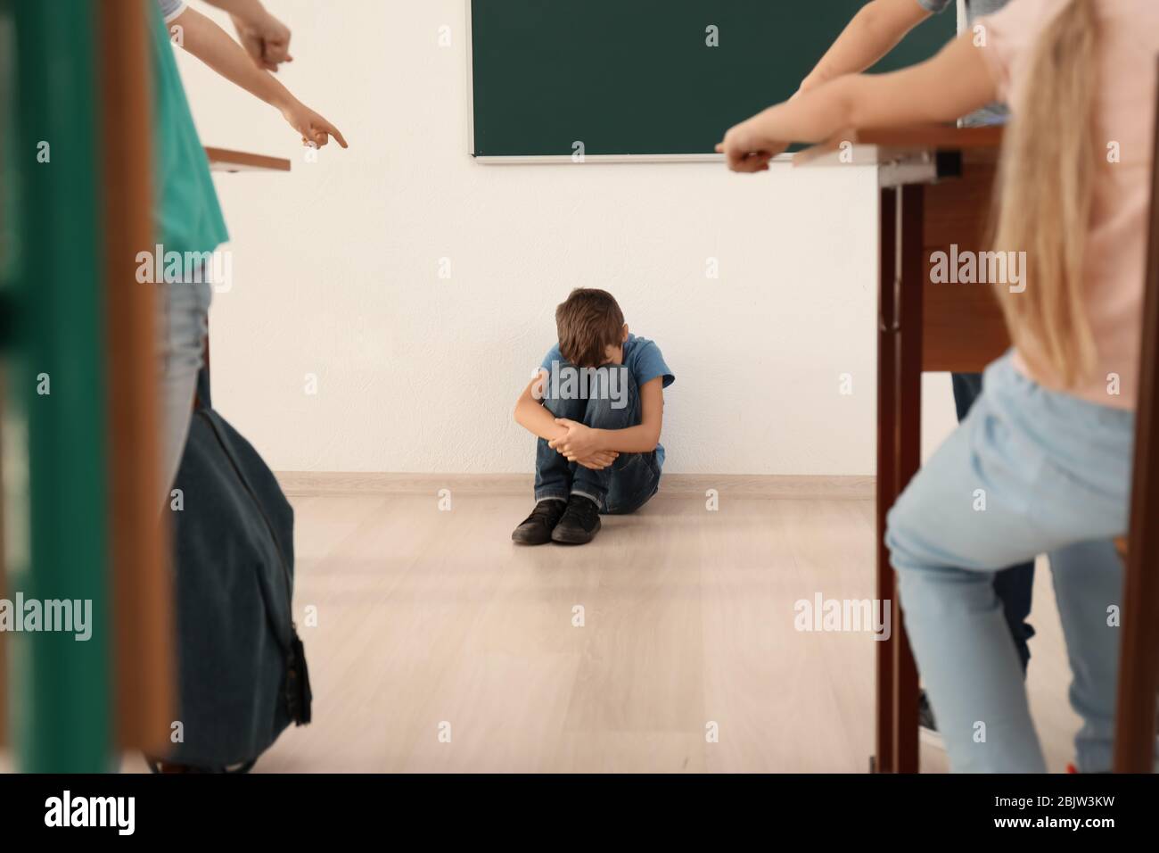 School boy crying classroom hi-res stock photography and images - Alamy