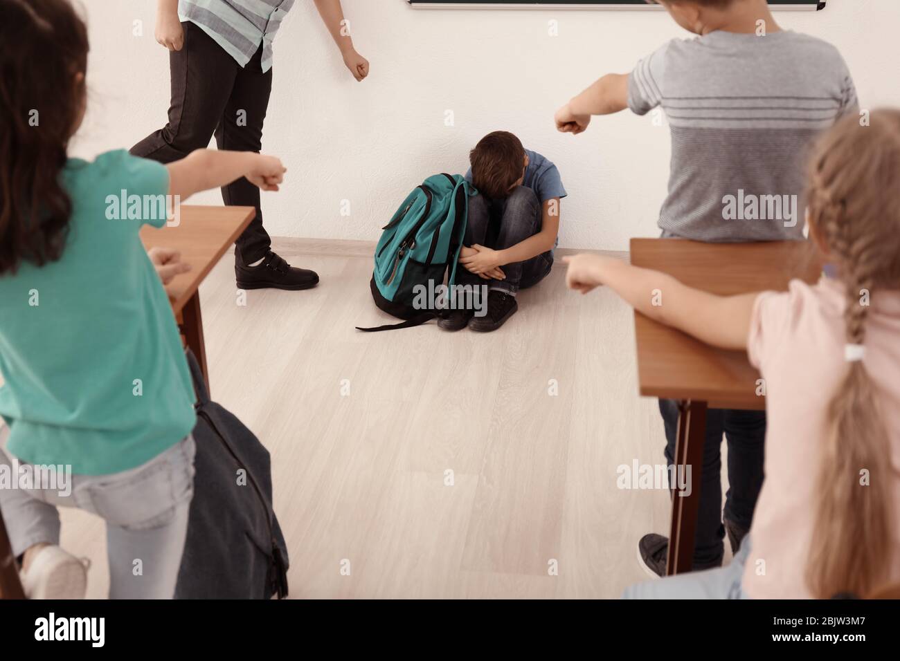 School boy crying classroom hi-res stock photography and images - Alamy