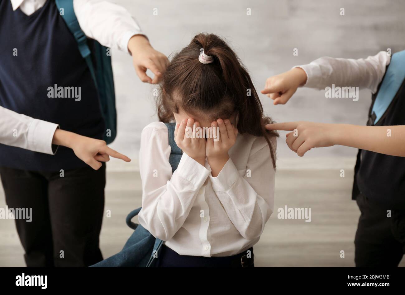 Children bullying their classmate indoors Stock Photo - Alamy