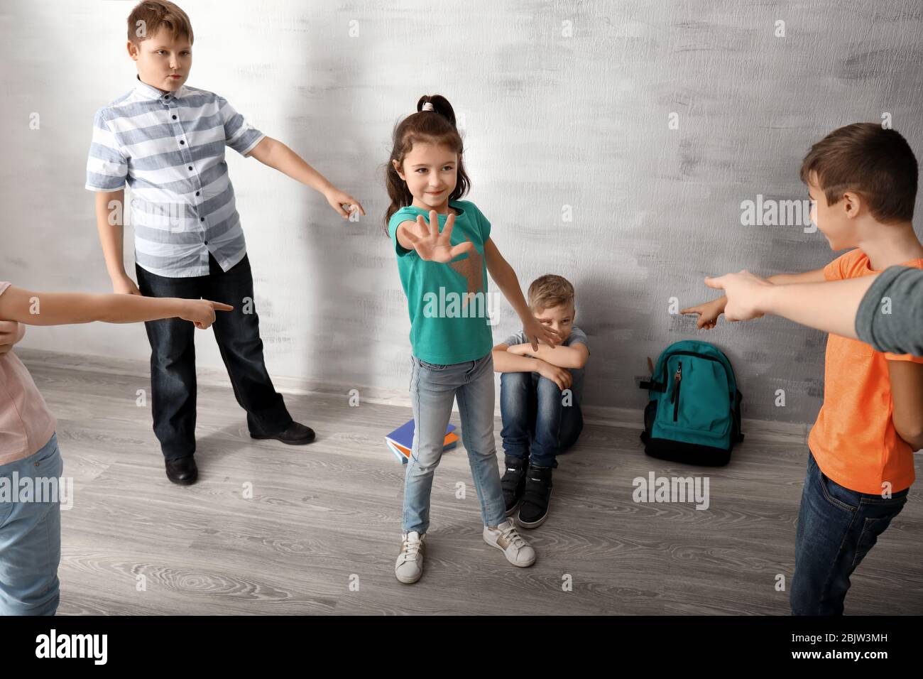Little girl protecting her classmate from bullying in school Stock ...