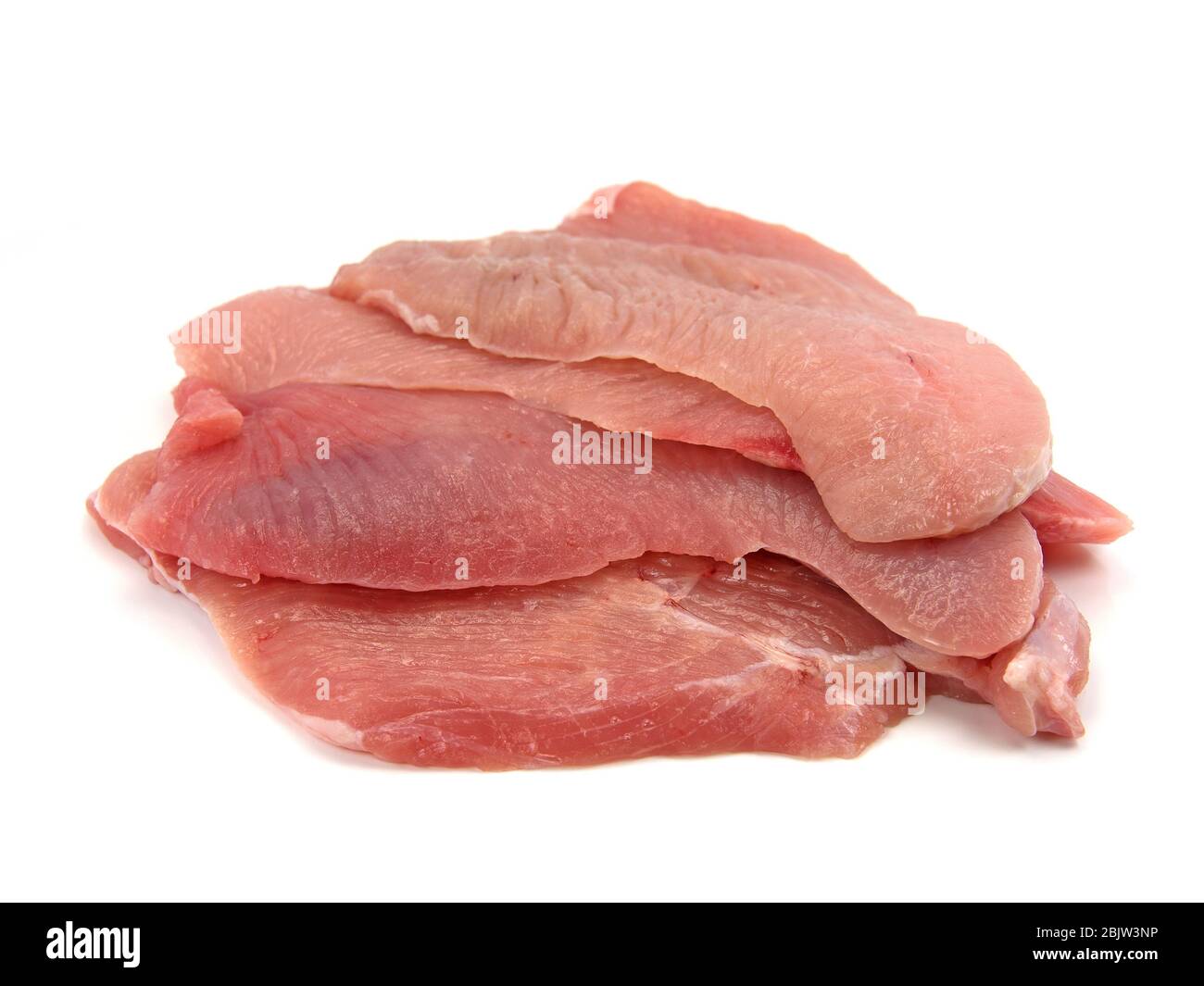 Turkey escalope against white background Stock Photo - Alamy