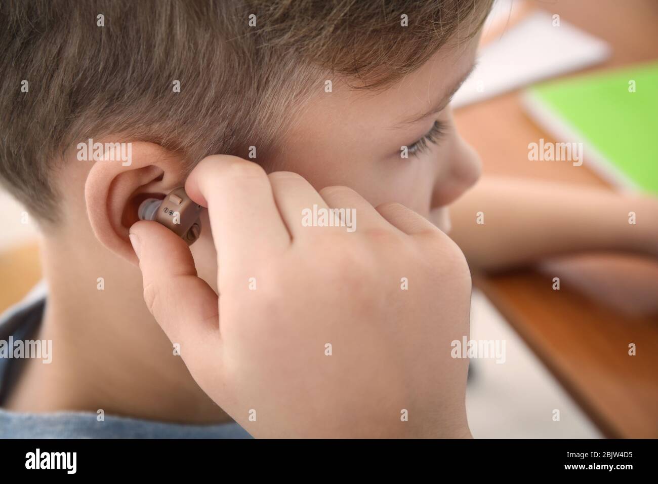 Child hearing aid school hi-res stock photography and images - Alamy