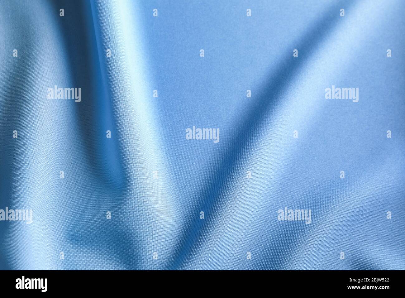 Fabric texture with folds as background Stock Photo - Alamy
