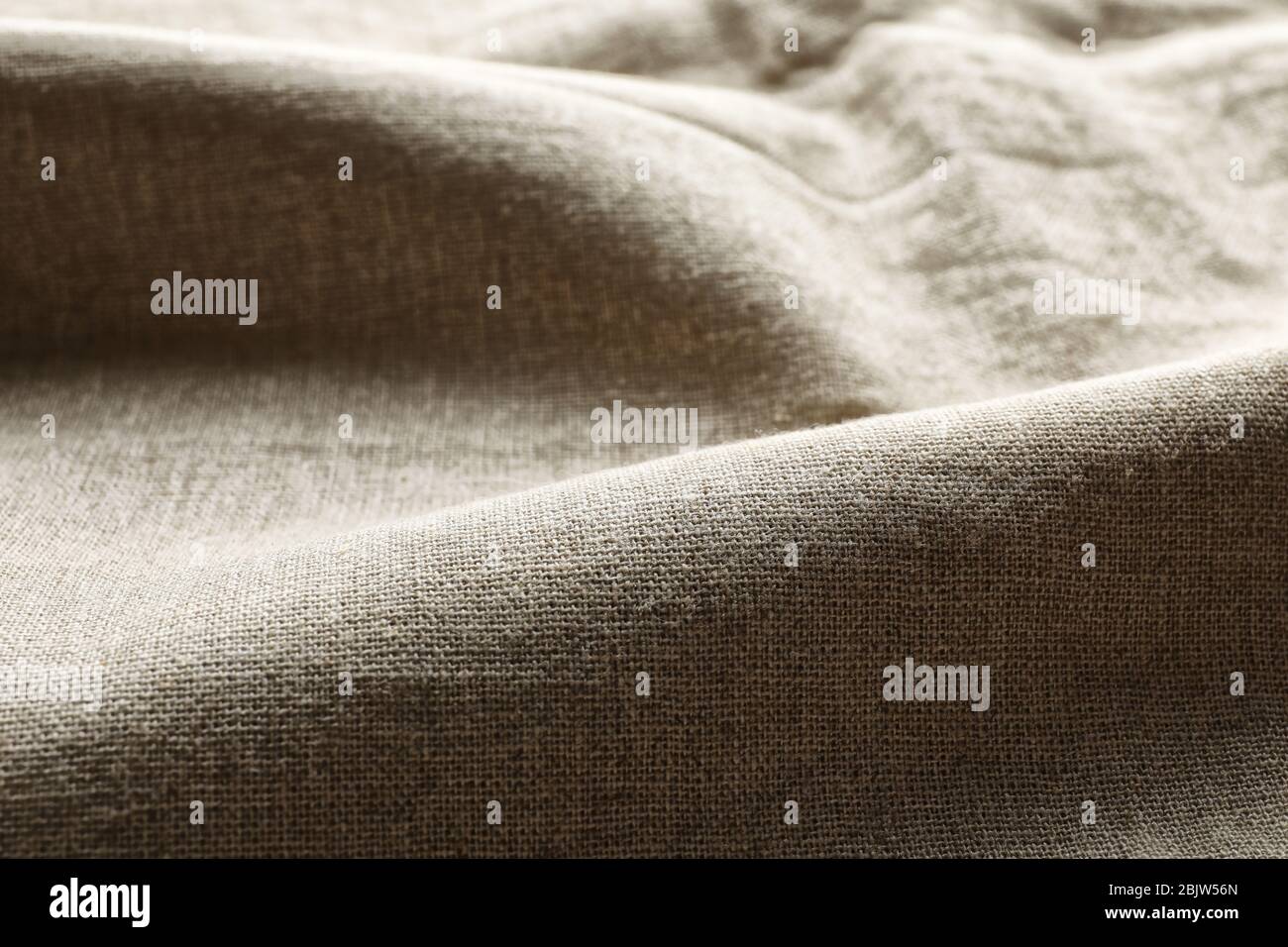 Fabric texture with folds as background Stock Photo - Alamy
