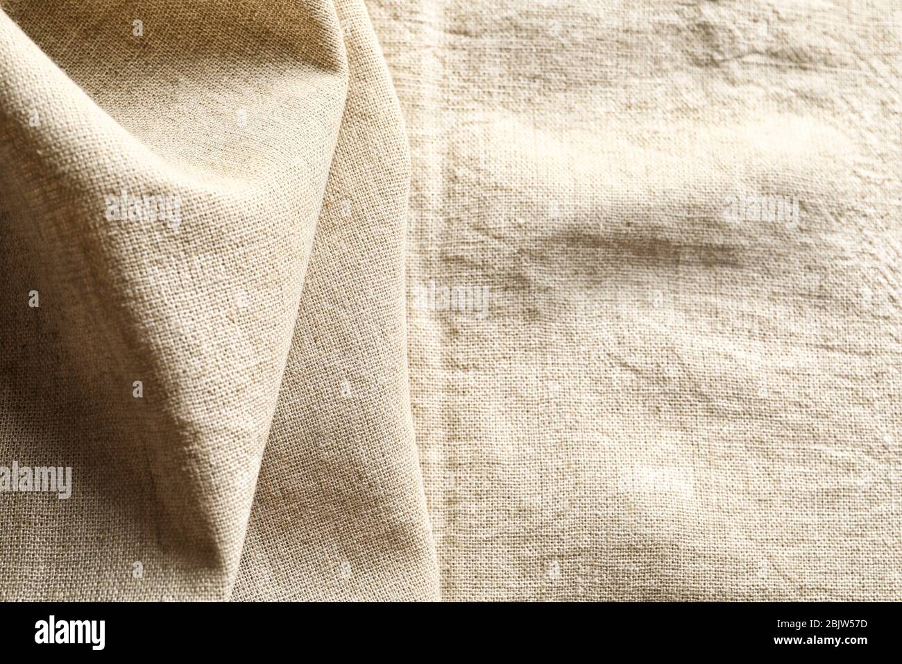 Fabric texture with folds as background Stock Photo - Alamy