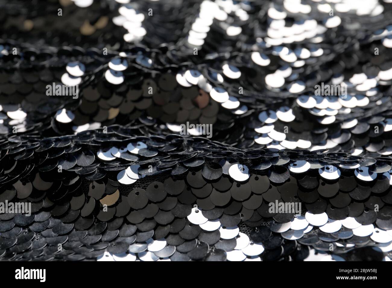 Sequined fabric texture as background Stock Photo - Alamy