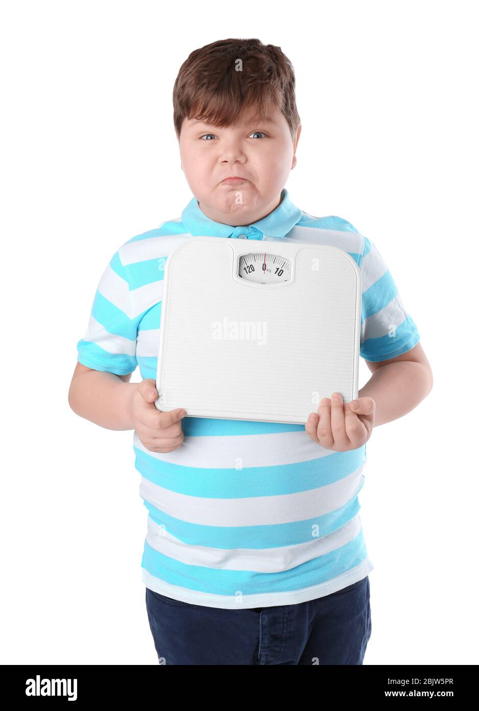 Overweight boy with floor scales on white background Stock Photo - Alamy